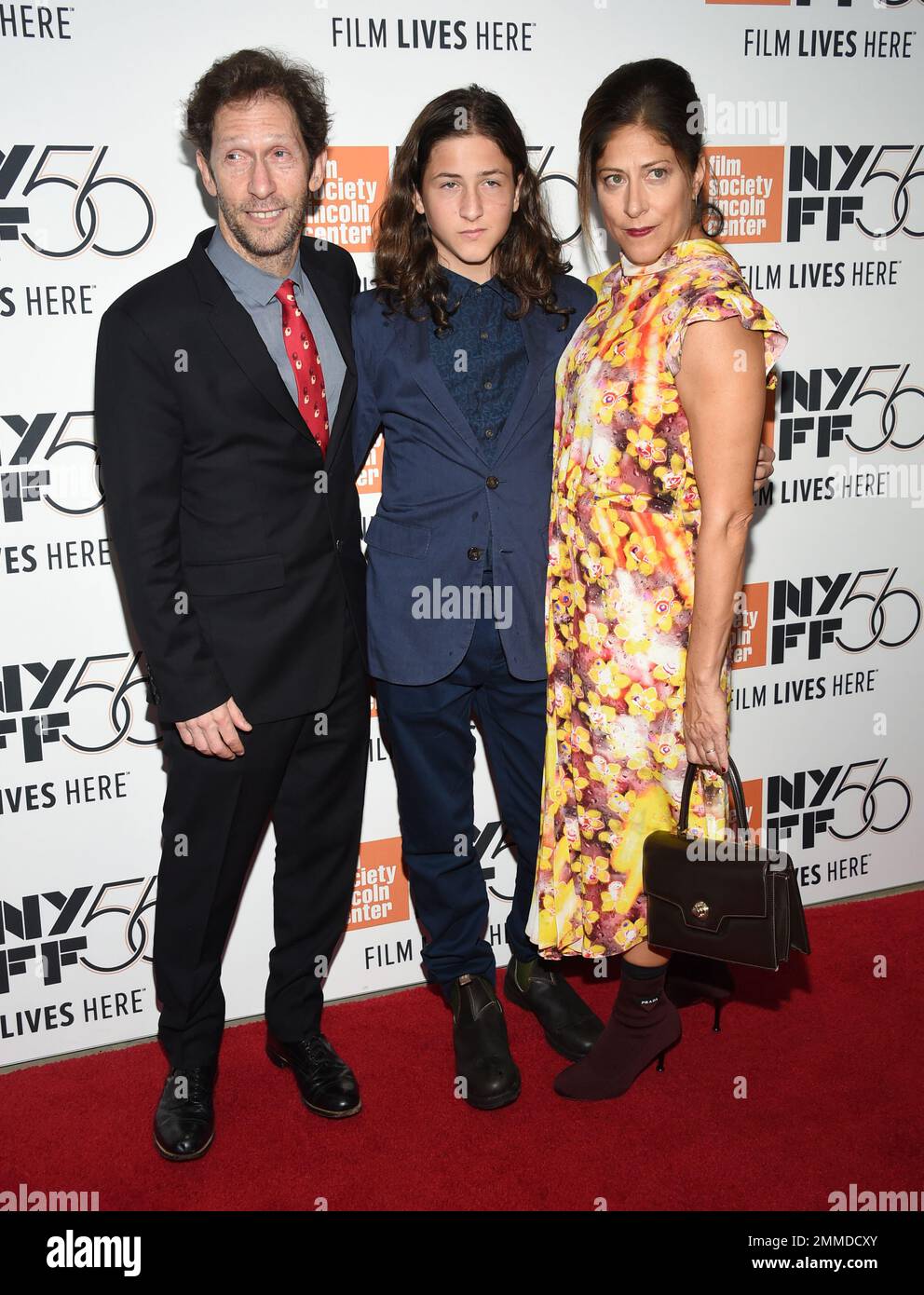 Actor Tim Blake Nelson, left, son Eli and wife Lisa Benavides-Nelson ...