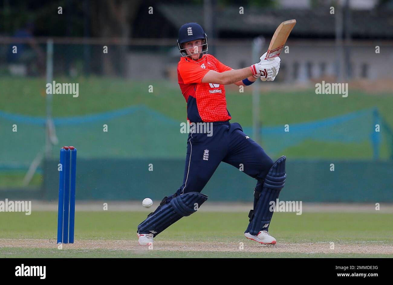 England's Joe Root plays a shot during their warm-up cricket match with ...