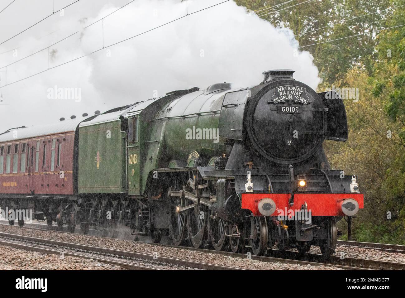 60103 Flying Scotsman returning to The National Railway Museum in heavy ...