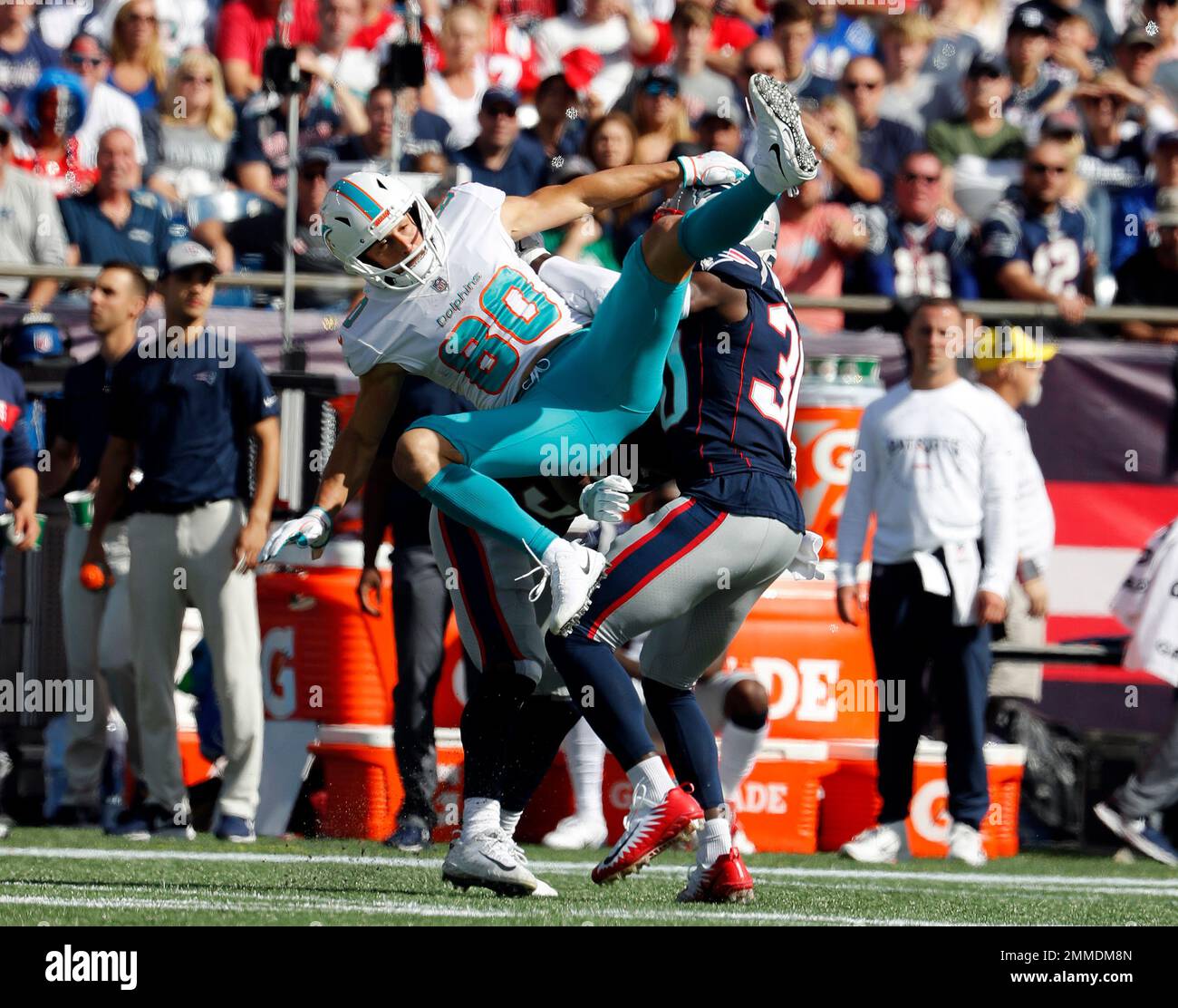 Miami Dolphins wide receiver Danny Amendola is upended by New England ...