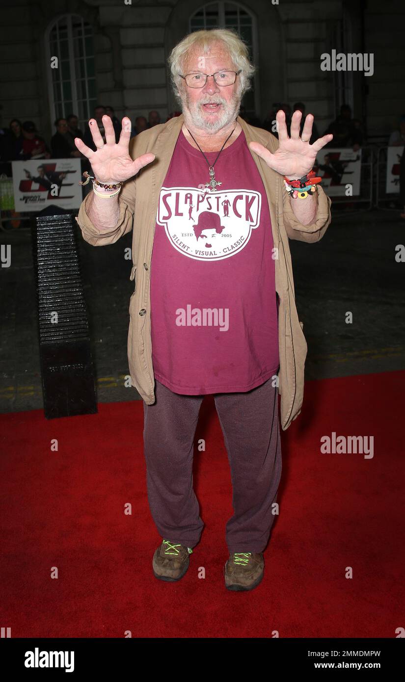 Presenter Bill Oddie poses for photographers upon arrival for the ...