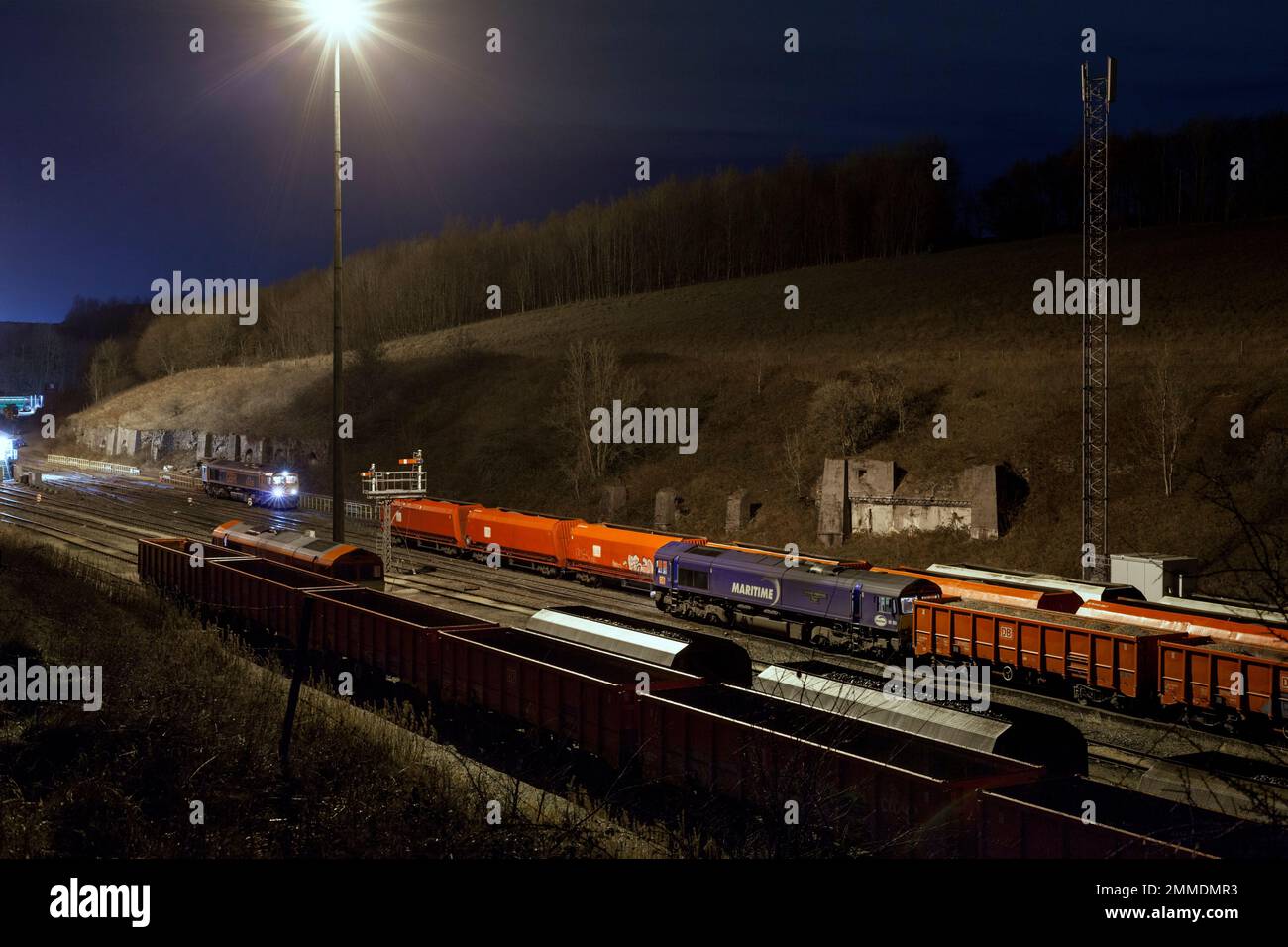 Class 66 locomotives and freight trains at Peak Forest, Derbyshire ...