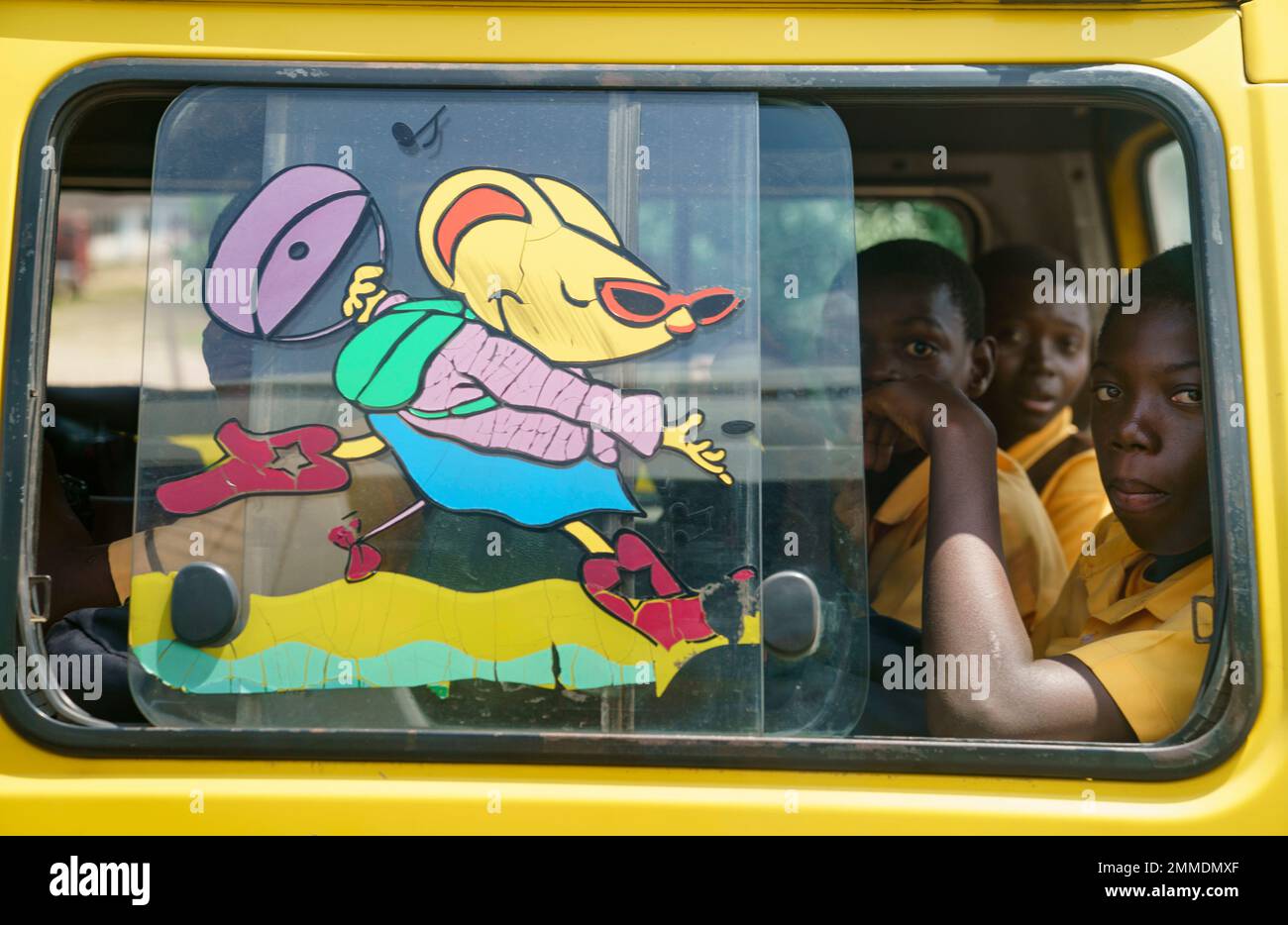 School boys ride in a bus on the N1 roadway seen from the moving media ...