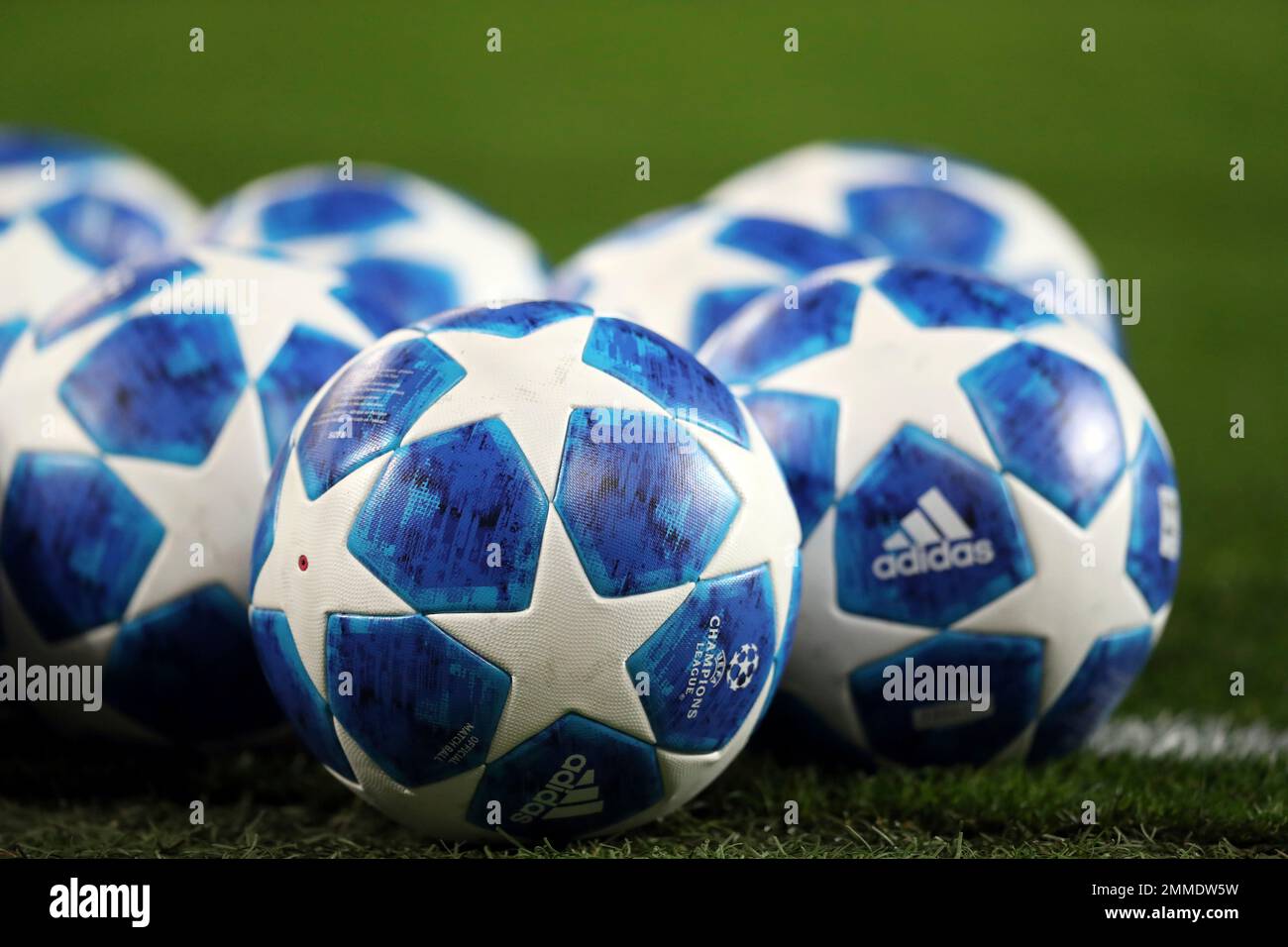 Footballs rest on the pitch before the Champions League group H soccer ...