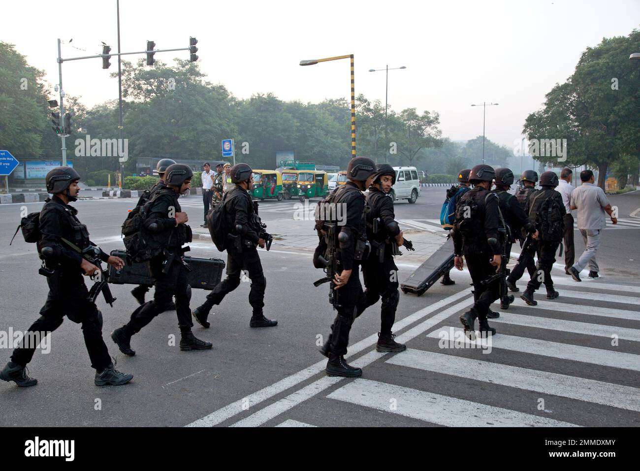 National Security Guard commandos walk to take position in and around ...
