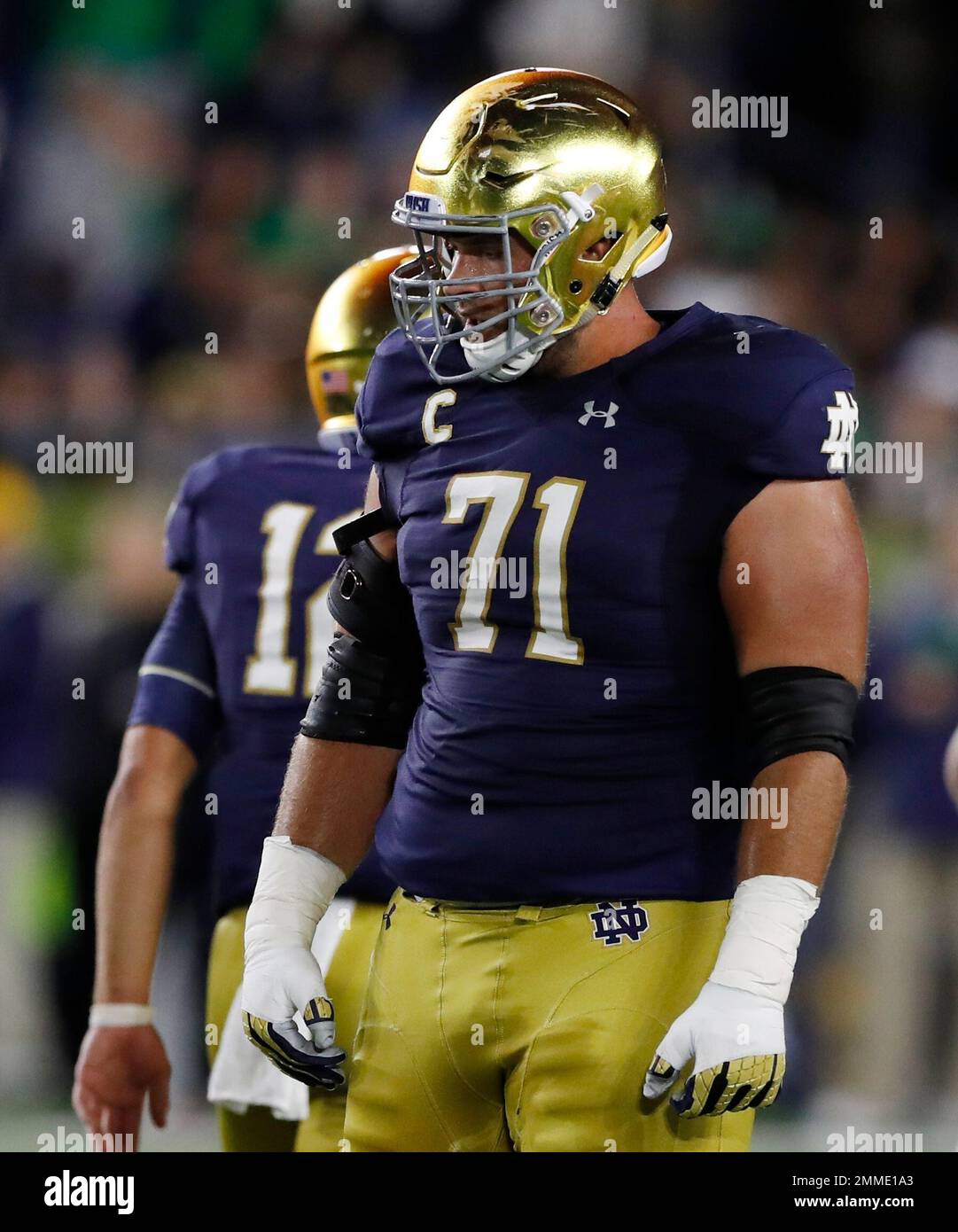 Notre Dame offensive lineman Alex Bars waits on the line during the ...