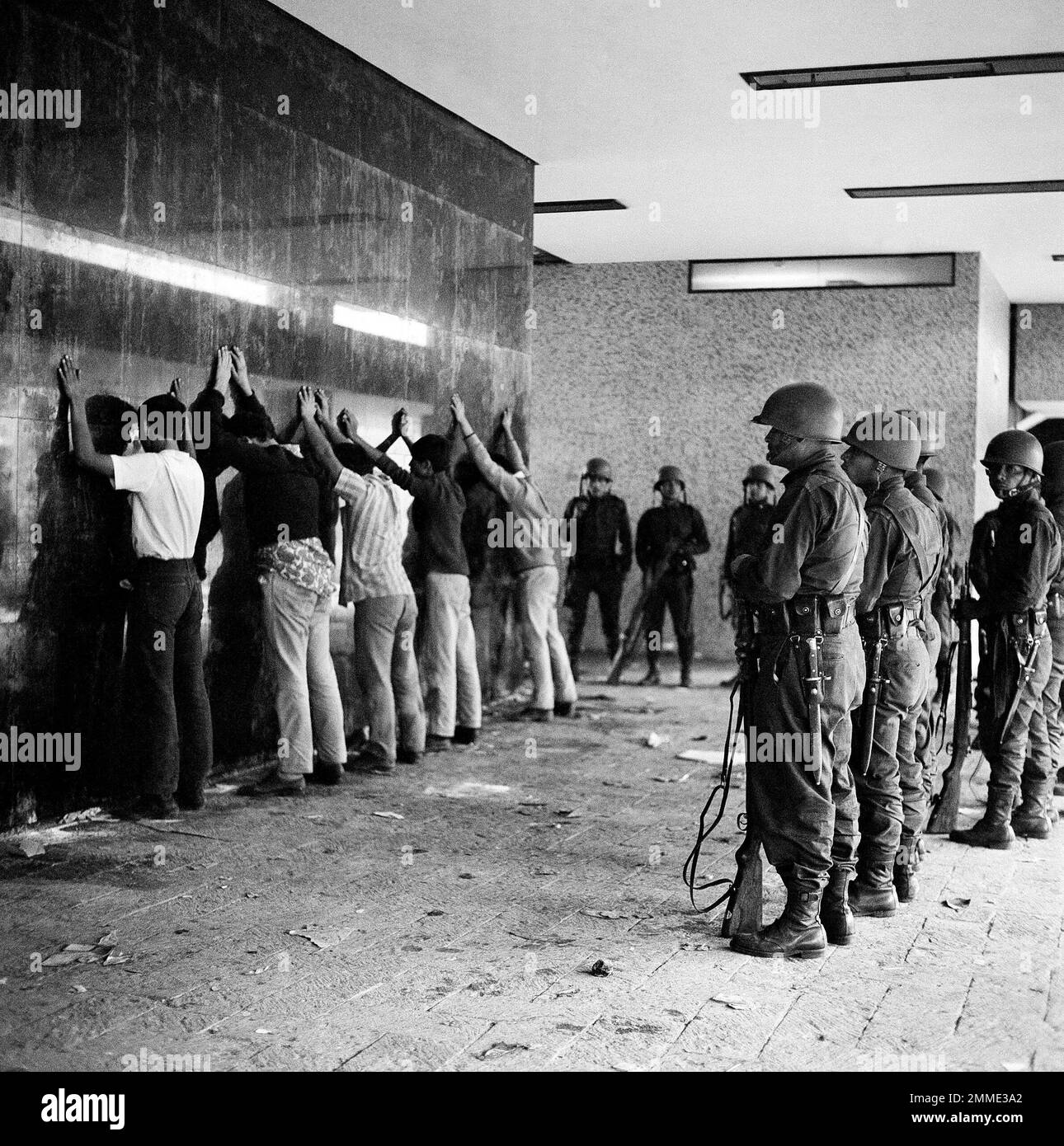 FILE - In this Oct. 3, 1968 file photo, Mexican soldiers guard a group ...