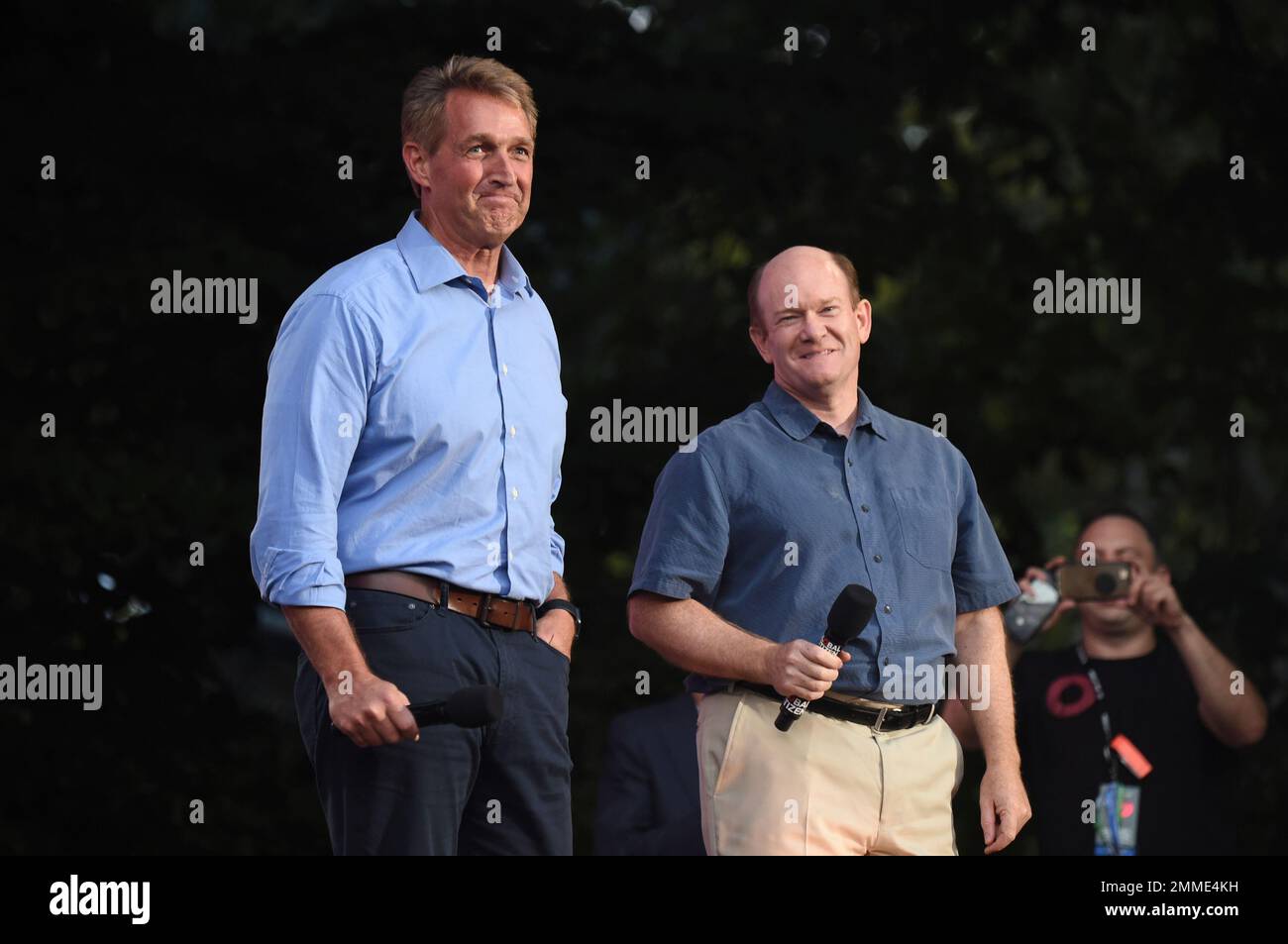 Sen. Jeff Flake, R-Ariz., left, and Sen. Chris Coons, D-Del., address ...
