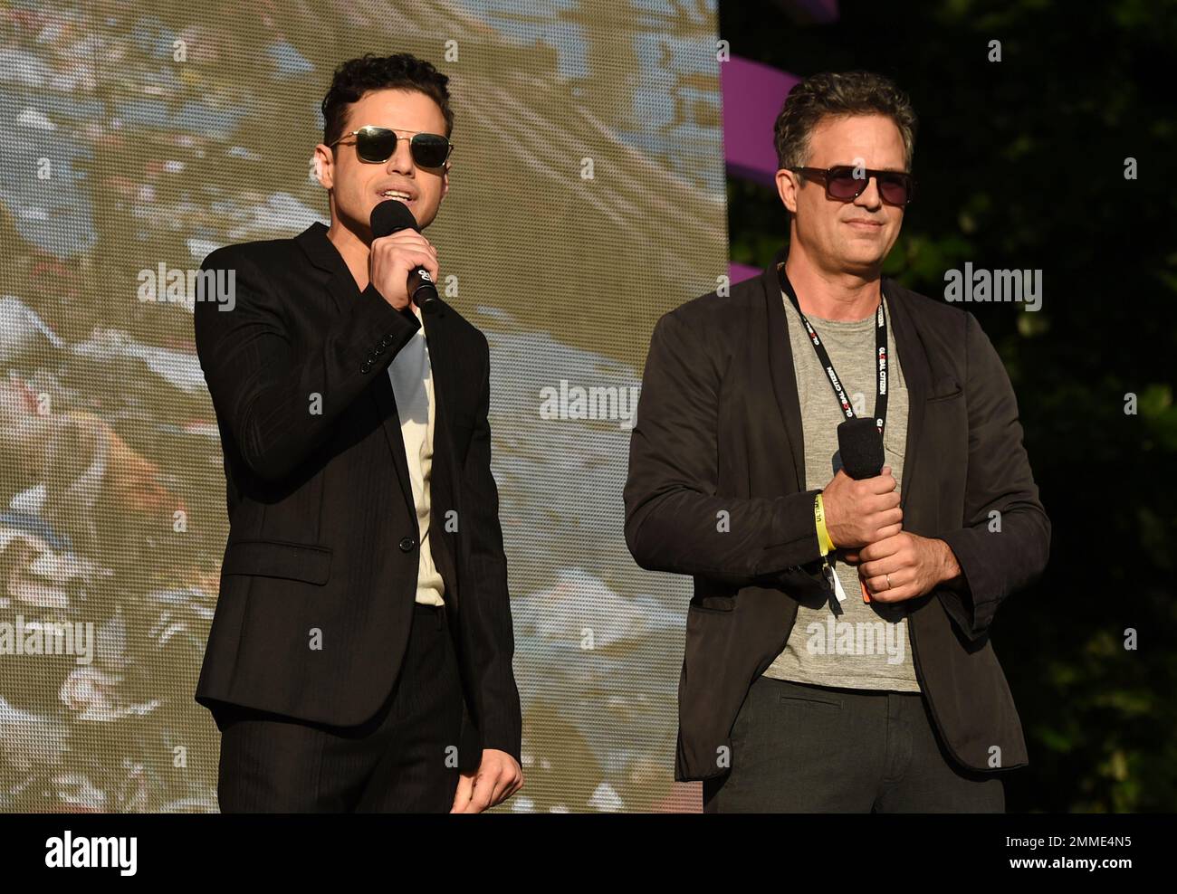 Actors Rami Malek, left, and Mark Ruffalo address the crowd at the 2018 ...