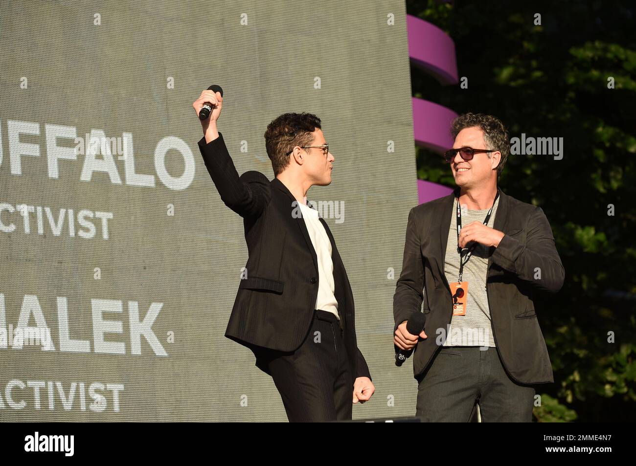 Actors Rami Malek, left, and Mark Ruffalo address the crowd at the 2018 ...