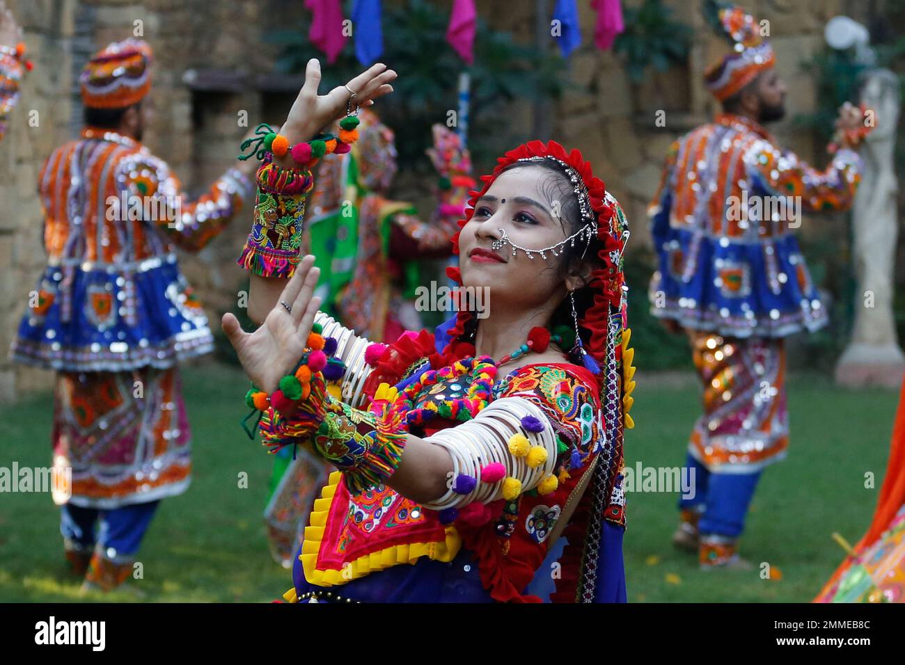 An Indian girl in traditional attire practices Garba dance ahead of ...