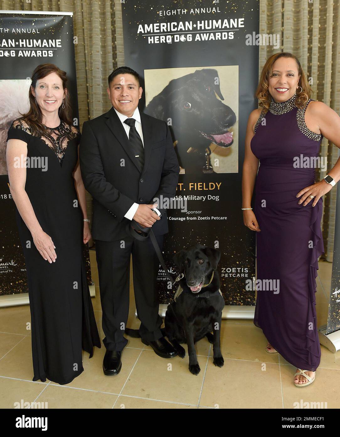 Dr. Tara Bidgood, from left, Nick Caceres, his dog Sgt. Fieldy, 2018 ...