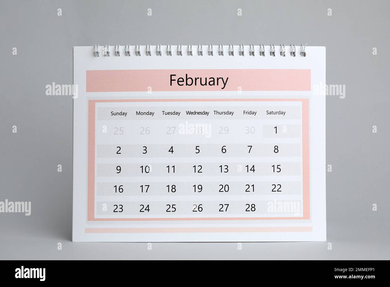 Paper calendar on grey background. Planning concept Stock Photo - Alamy