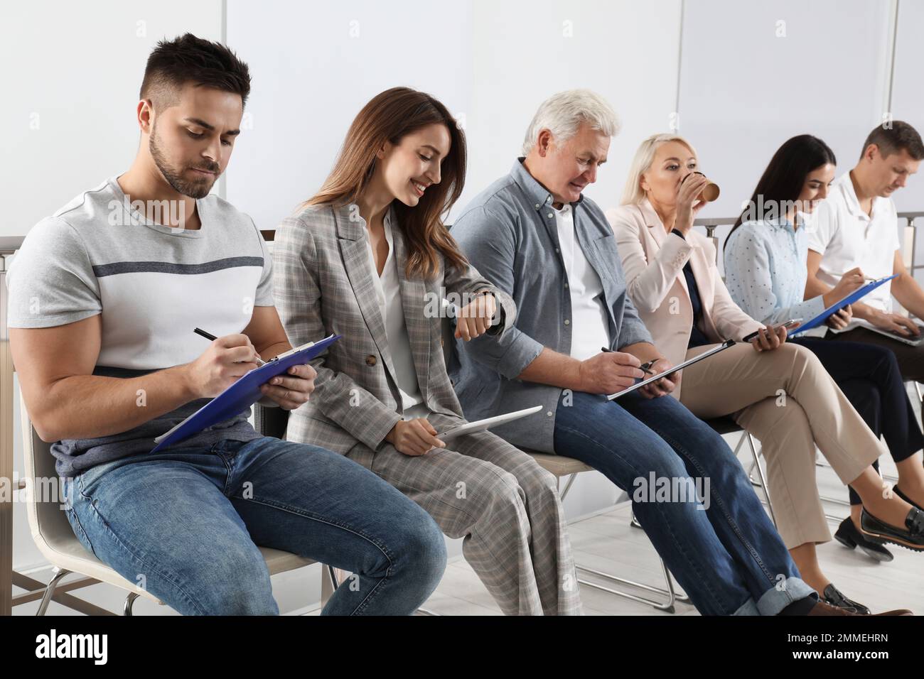 Middle aged man waiting checking hi-res stock photography and images ...