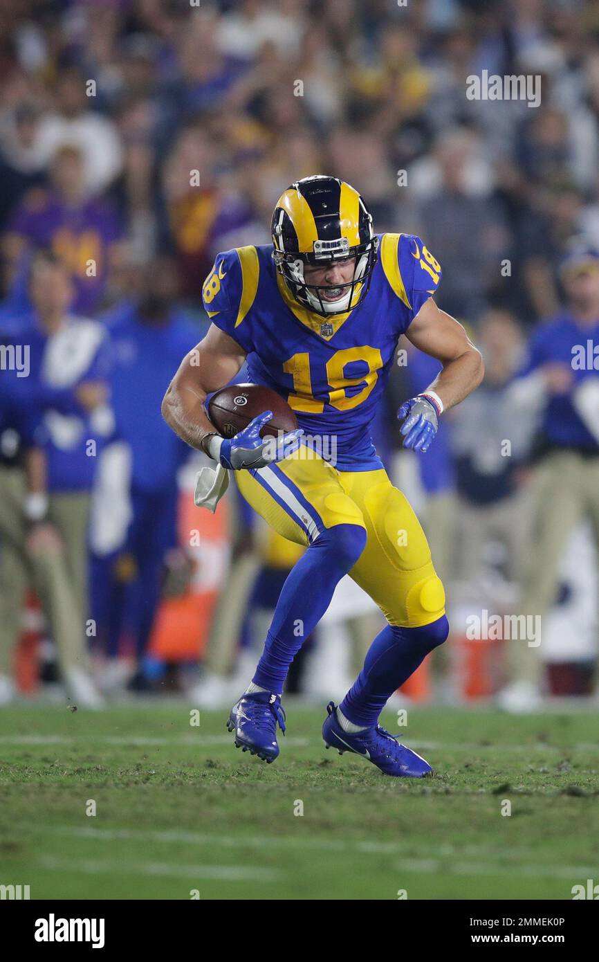 Los Angeles Rams wide receiver Cooper Kupp carries the ball during an ...