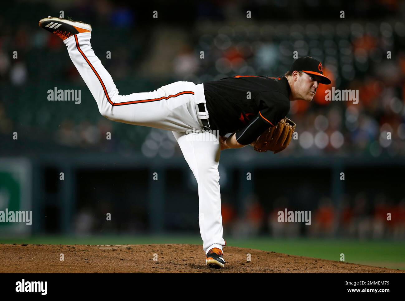 Baltimore Orioles starting pitcher David Hess follows through to the ...