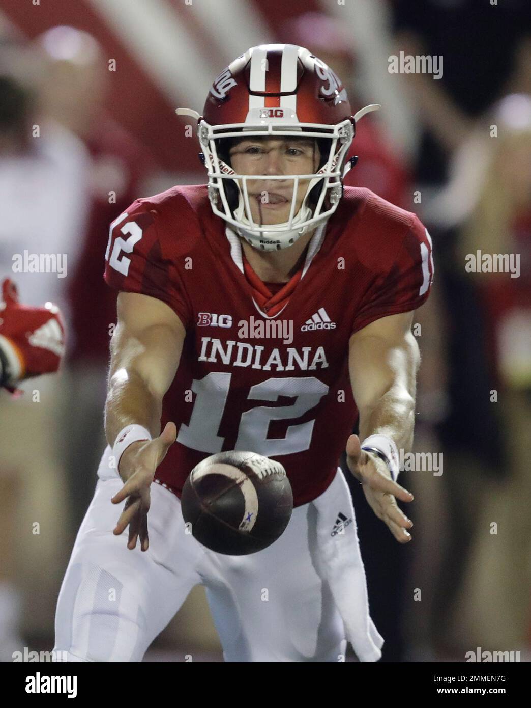 Indiana quarterback Peyton Ramsey (12) makes a toss during the first ...