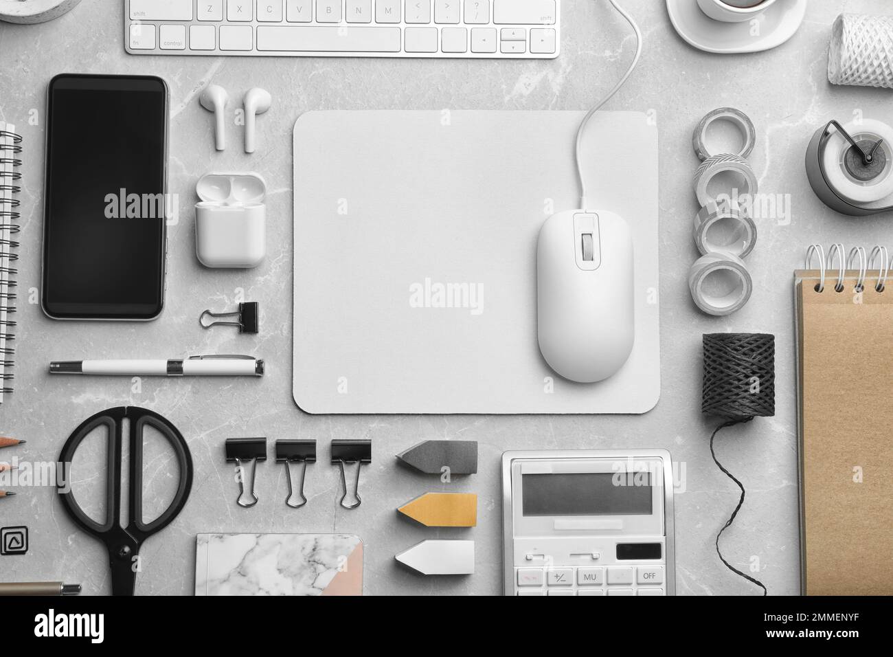 Flat lay composition with wired computer mouse and stationery on light ...