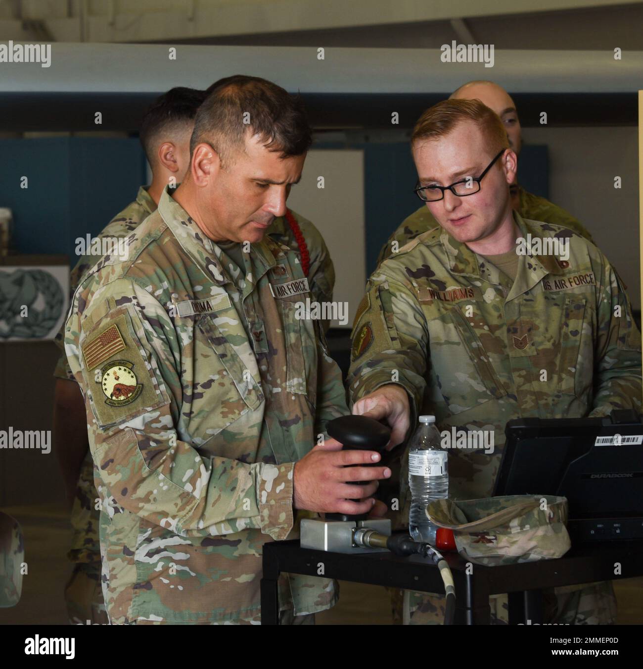 Second Air Force Vice Commander Col. Nicholas Dipoma operates a sensor ...