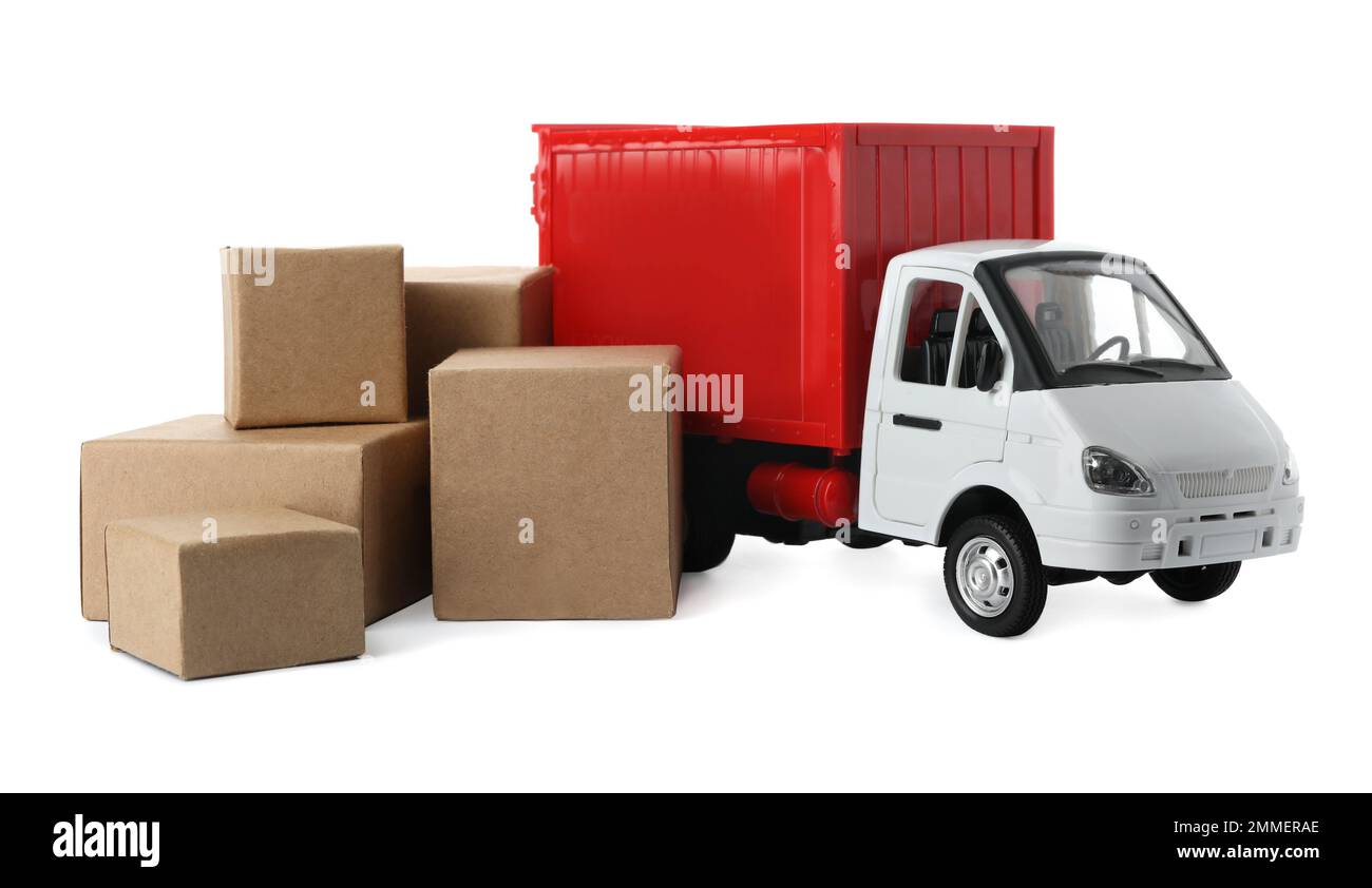 Toy truck with boxes isolated on white. Logistics and wholesale concept ...