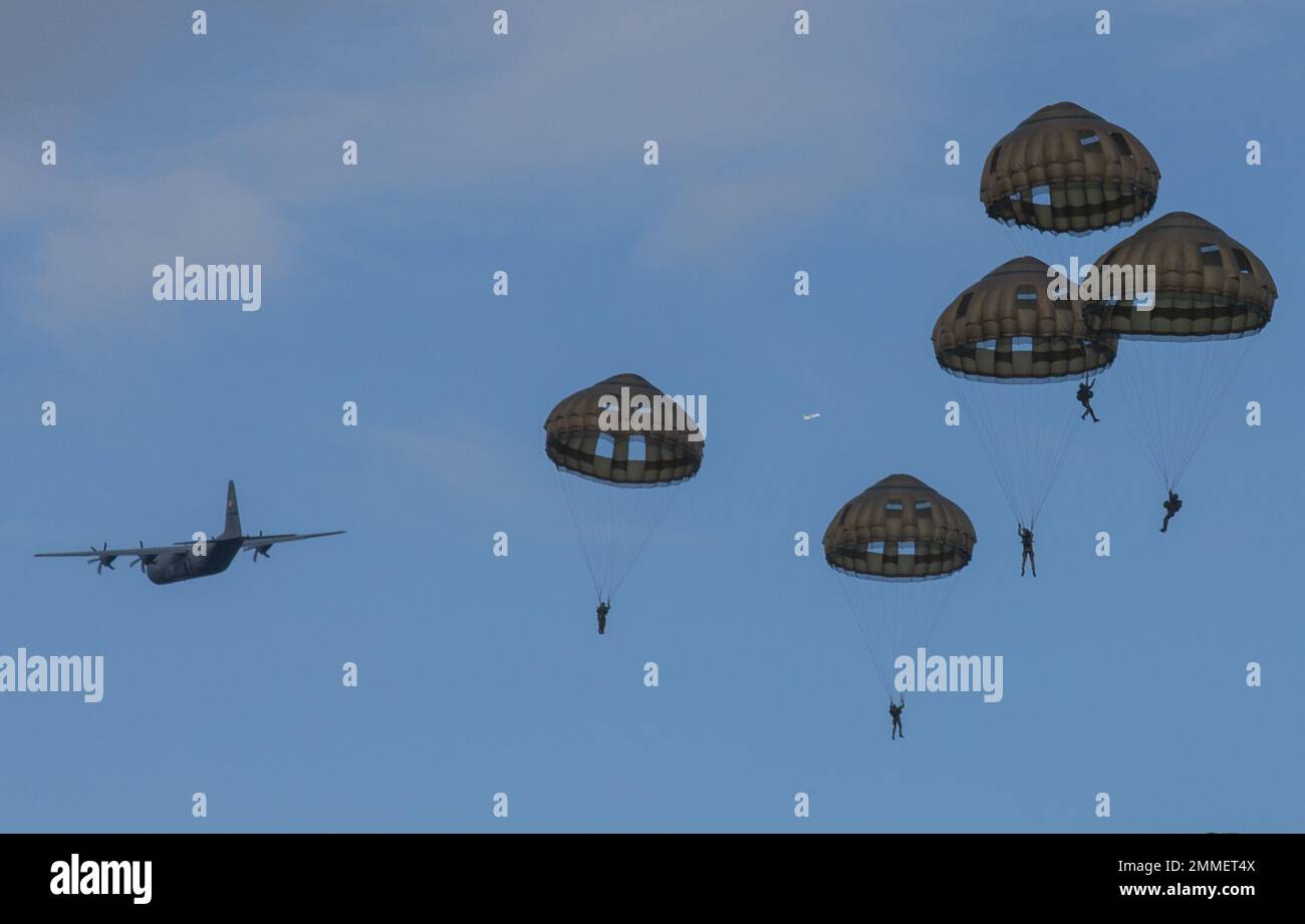 A group of U.S. Army and European Paratroopers descends onto the Drop ...