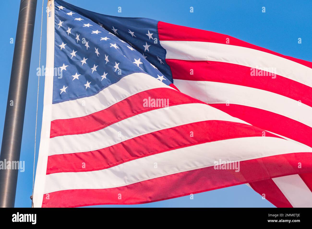 US and Pennsylvania flags on blue sky background, copy space image ...