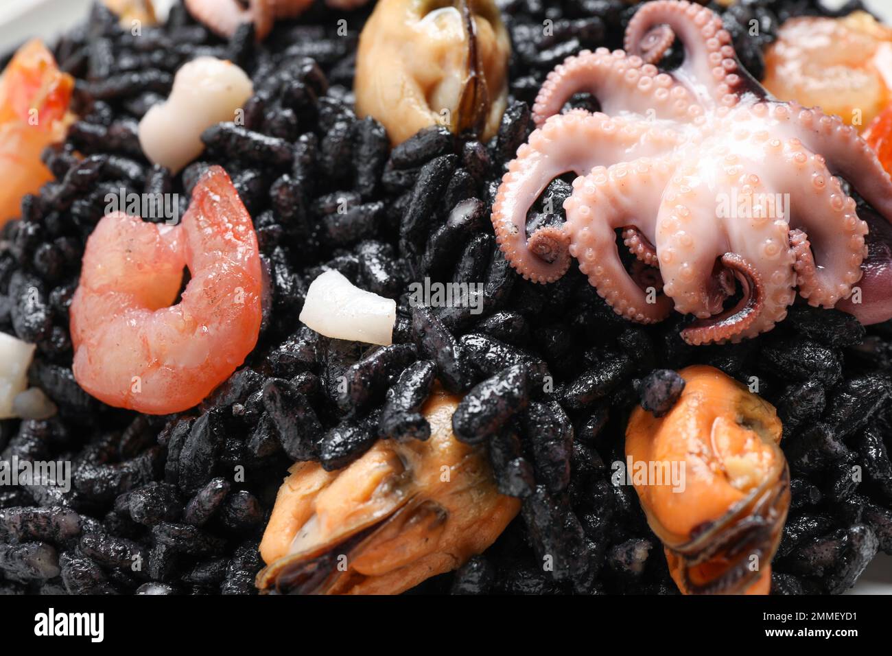 Delicious black risotto with seafood as background, closeup Stock Photo ...