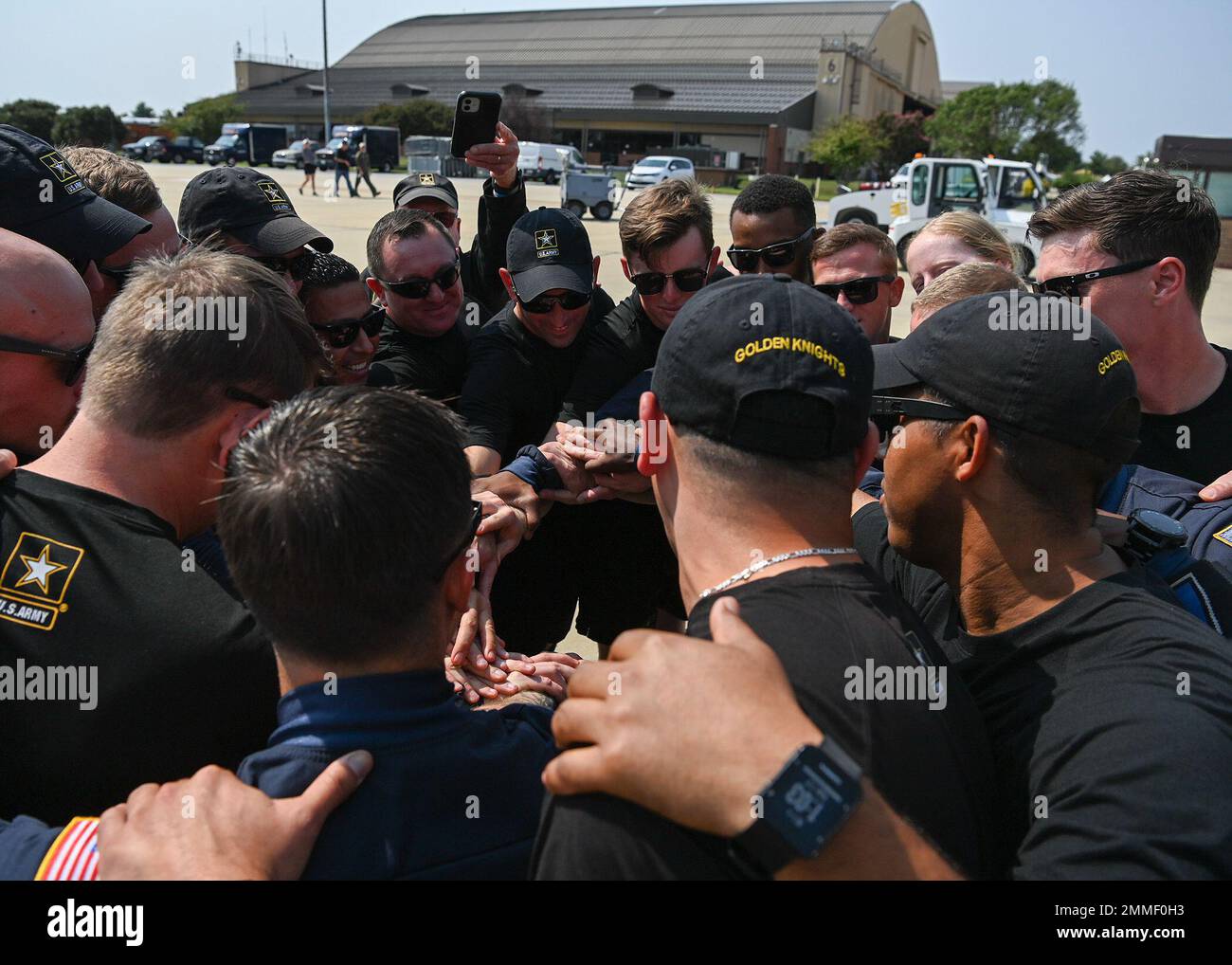 Members of the U.S. Army Parachute Team, the “Golden Knights,” and the ...