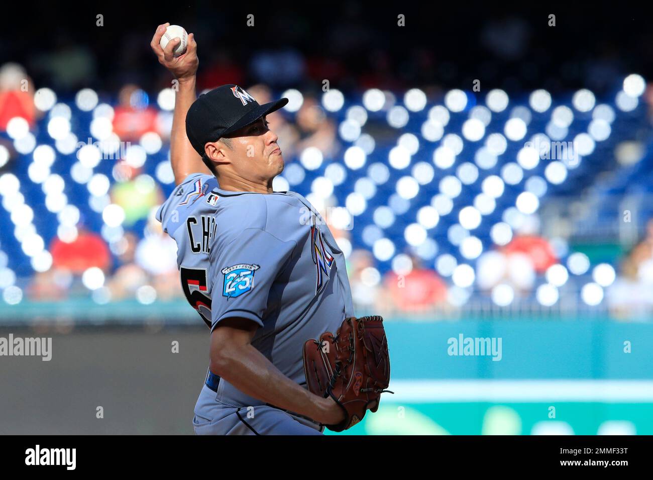 Miami Marlins starting pitcher Wei-Yin Chen (54) throws during the ...
