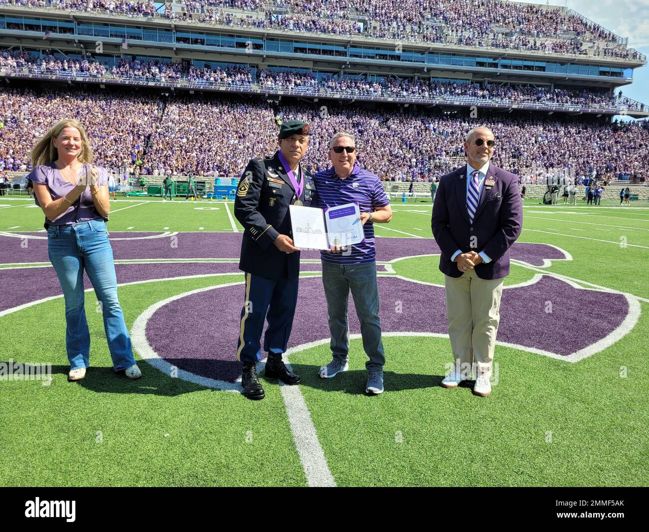 U.S. Army Sgt. Maj. Antonio Gonzalez (center left) receives the Medal ...