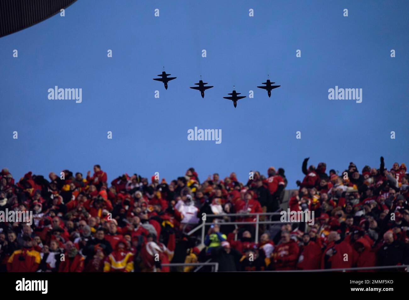 Military aircraft fly over the Arrowhead Stadium before the NFL AFC ...
