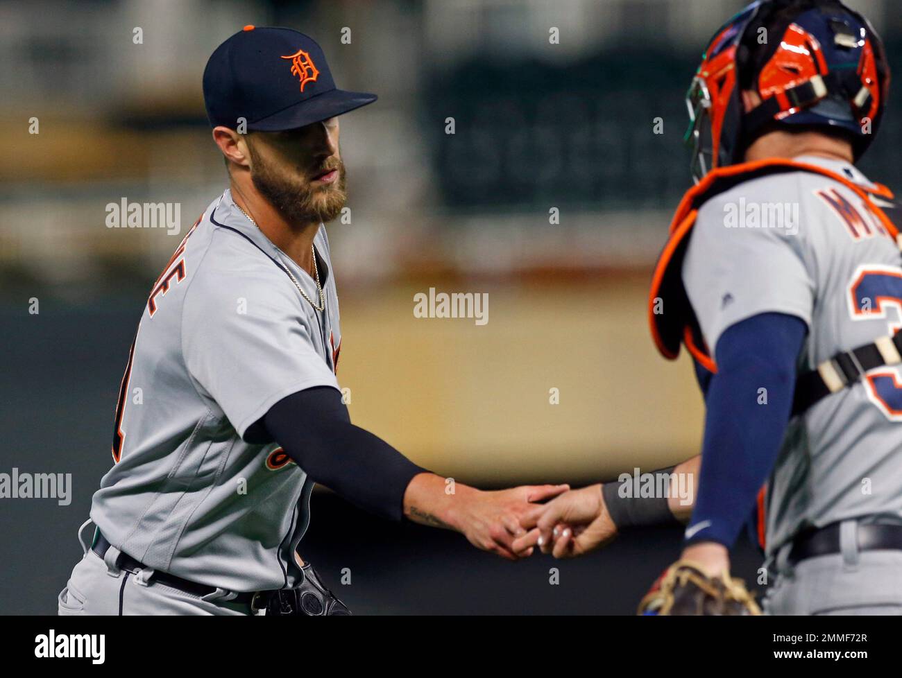 Detroit Tigers pitcher Shane Greene, left, and catcher James McCann ...