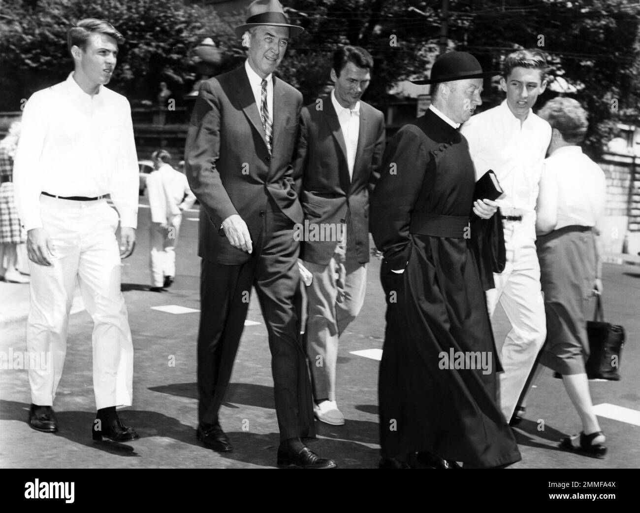 Walking in a Rome street on July 22, 1960, are left to right; Ronald ...