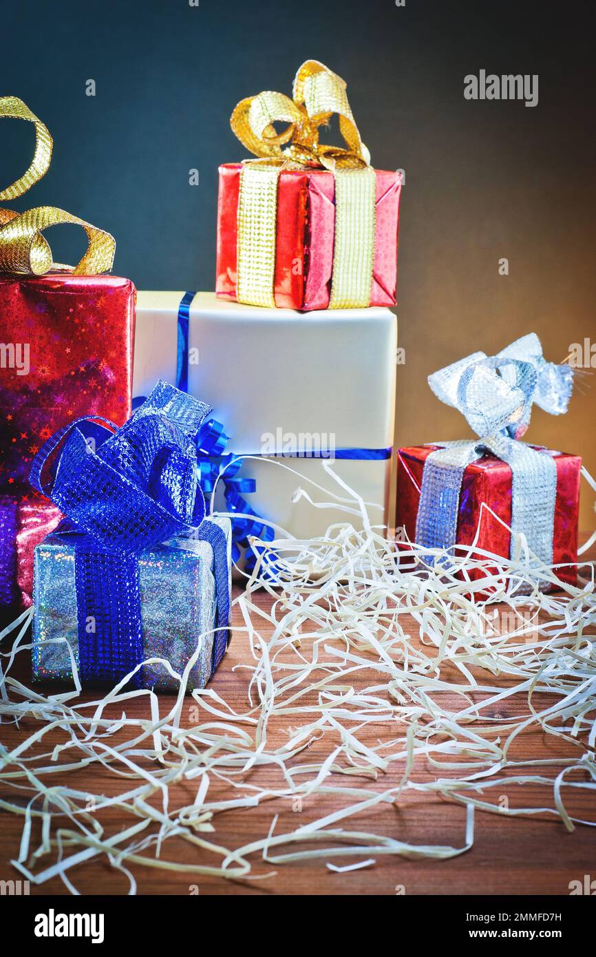 Groups of gift items decorated with different paper Stock Photo - Alamy