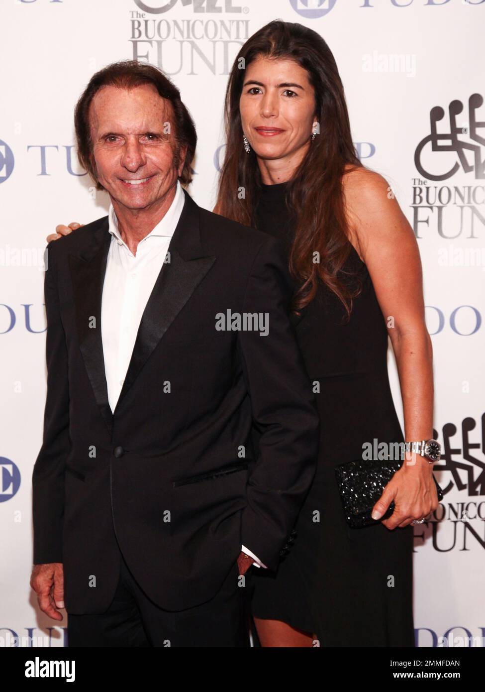 Emerson Fittipaldi, left, and Rossana Fanucchi, right, attend the 33rd ...