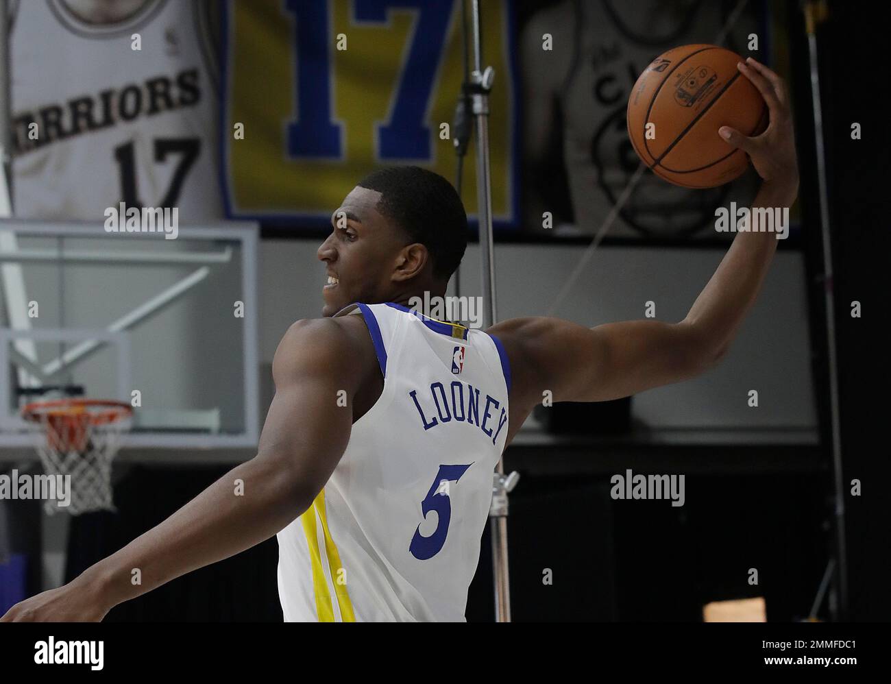 Golden State Warriors' Kevon Looney poses for photos during media day ...