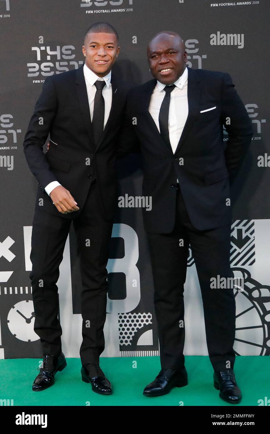 French soccer player Kylian Mbappe, left, and his father Wilfried ...