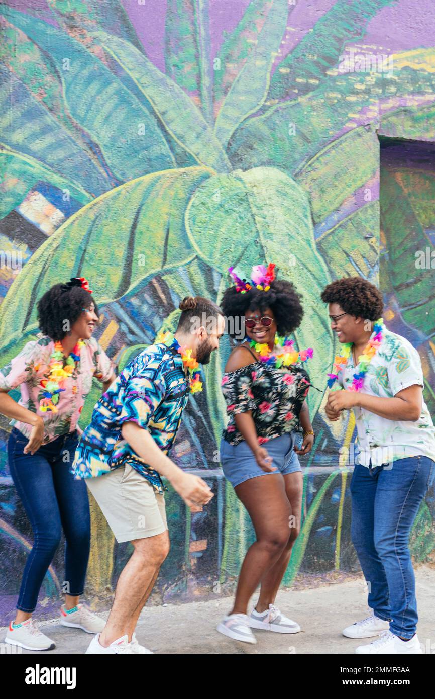 Group of Latino friends having fun at a street party Stock Photo - Alamy