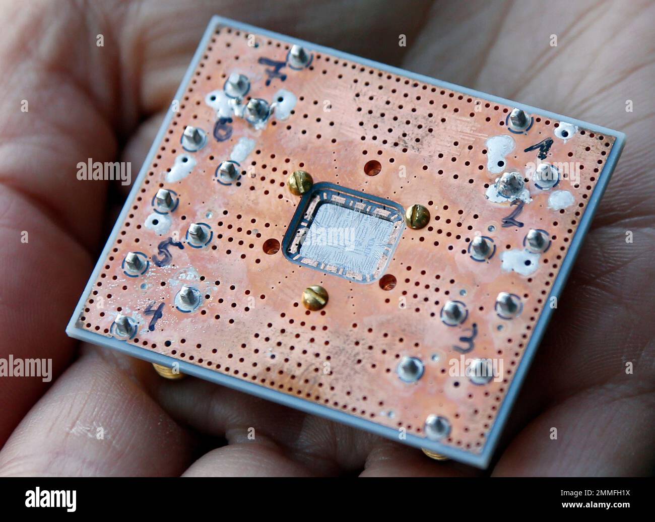 This Feb. 27, 2018, photo shows a seven cubit quantum device is seen at ...