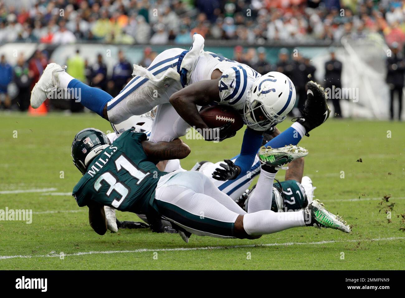 Indianapolis Colts' Zach Pascal (14) is hit by Philadelphia Eagles ...