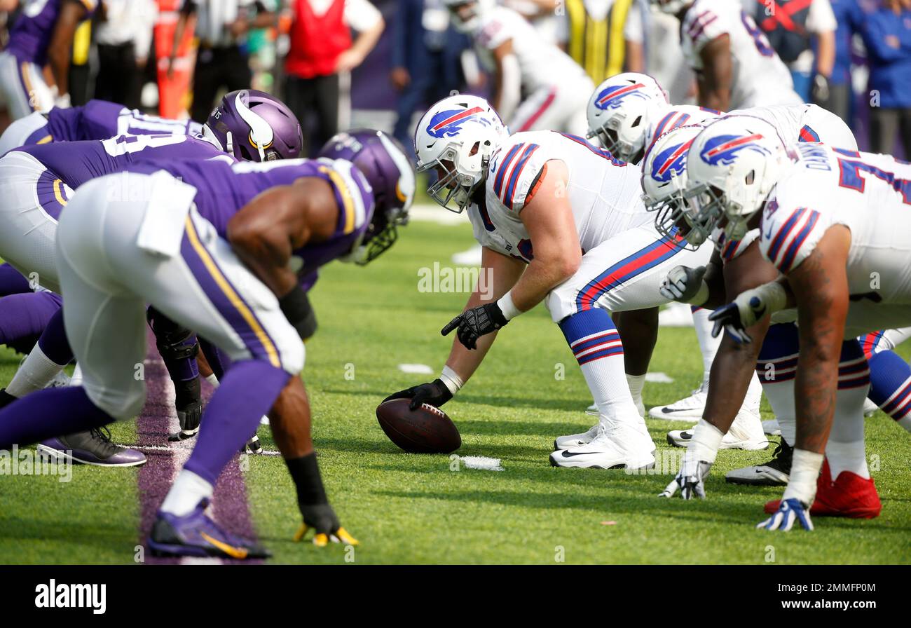 Players get set on the line of scrimmage during the first half of an ...