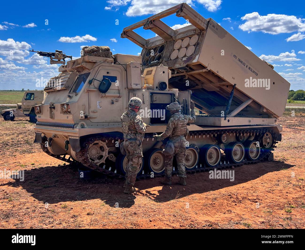 Sgt. Johnathan Hill, section chief, and Spc. Marvin Taylor, a gunner ...