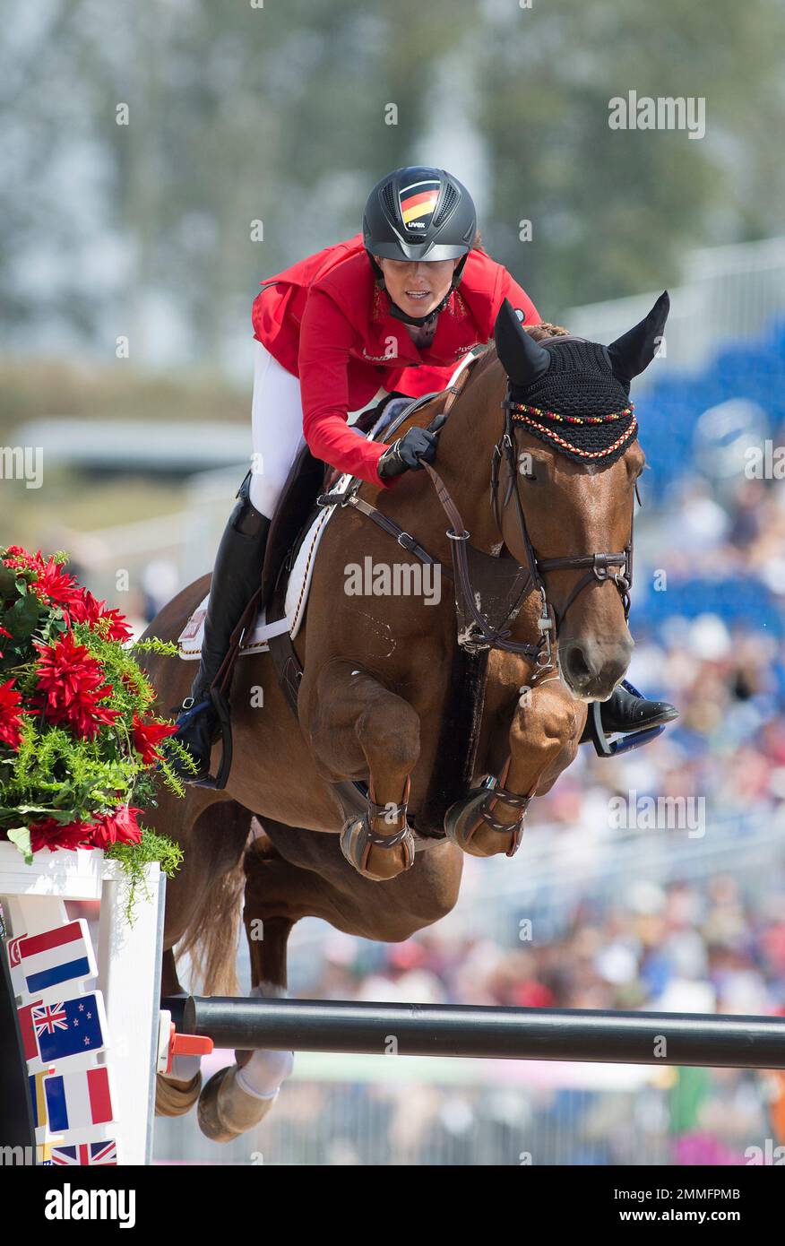 Germany's Simone Blum, aboard DSP Alice, wins the gold medal in the ...