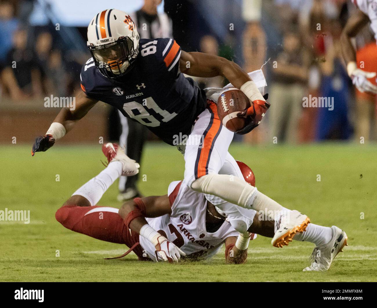 Auburn wide receiver Darius Slayton (81) makes Arkansas defensive back Jarques McClellion (24 ...