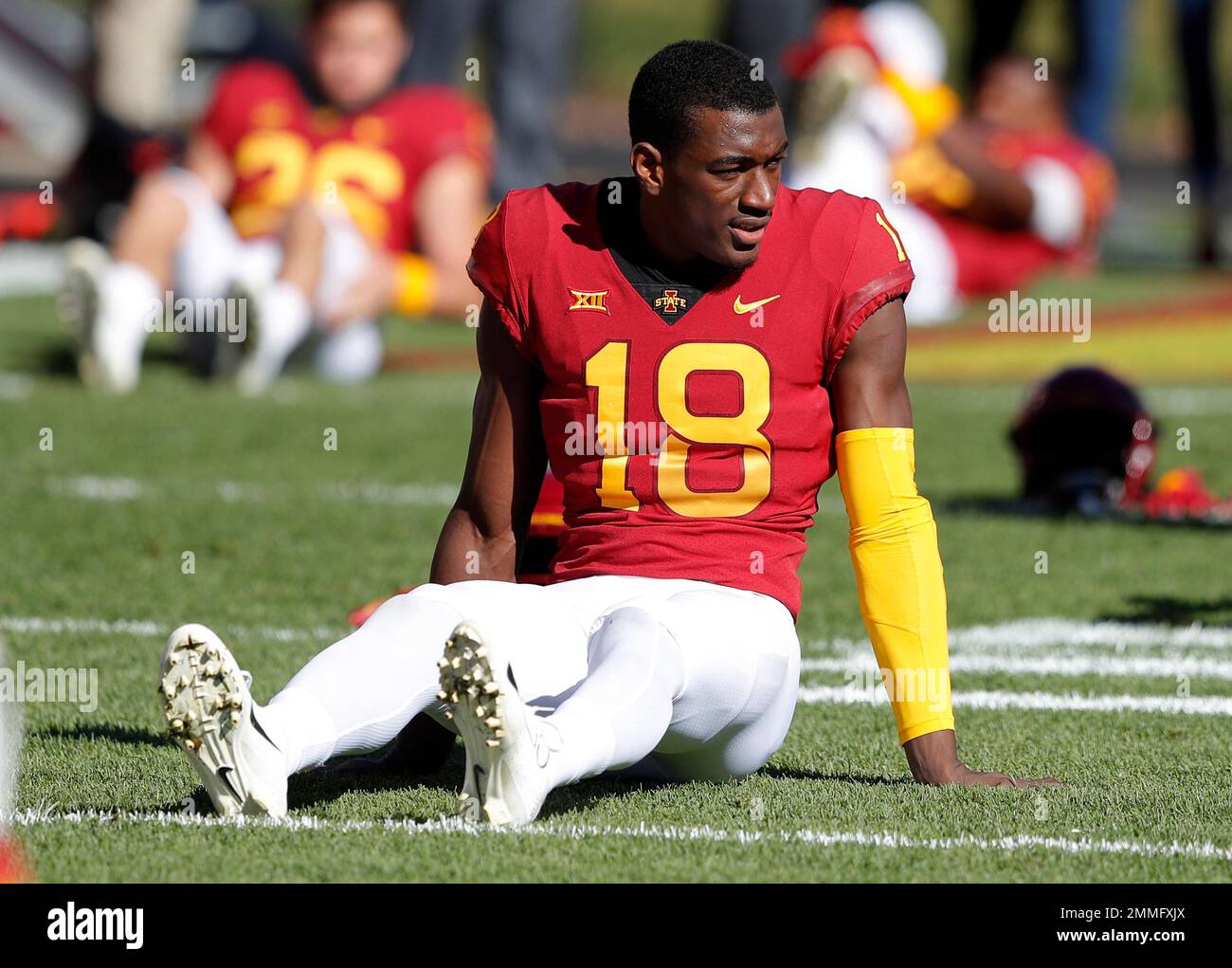 Iowa State wide receiver Hakeem Butler stretches before an NCAA college ...