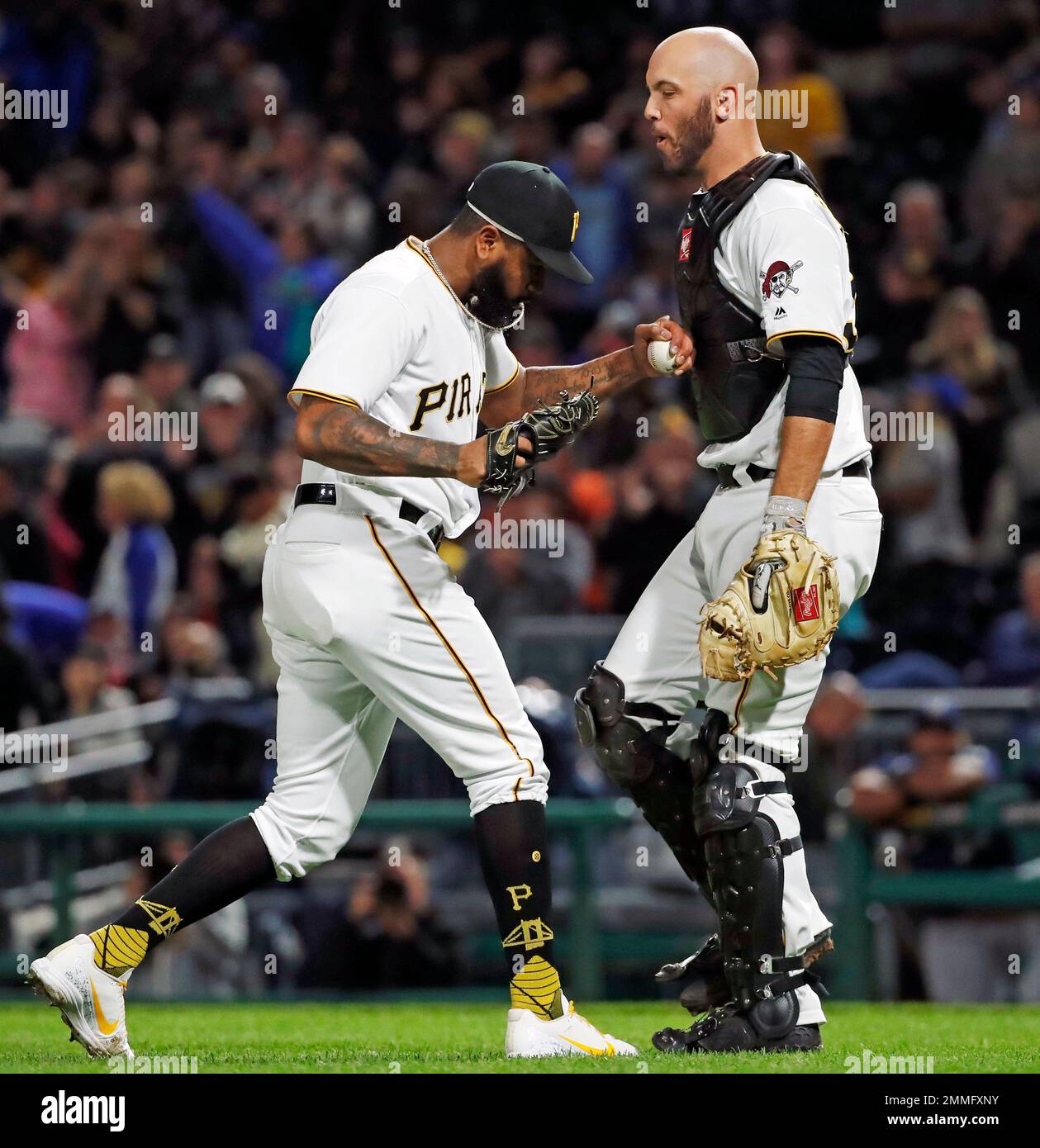 Pittsburgh Pirates relief pitcher Felipe Vazquez, left, celebrates with ...
