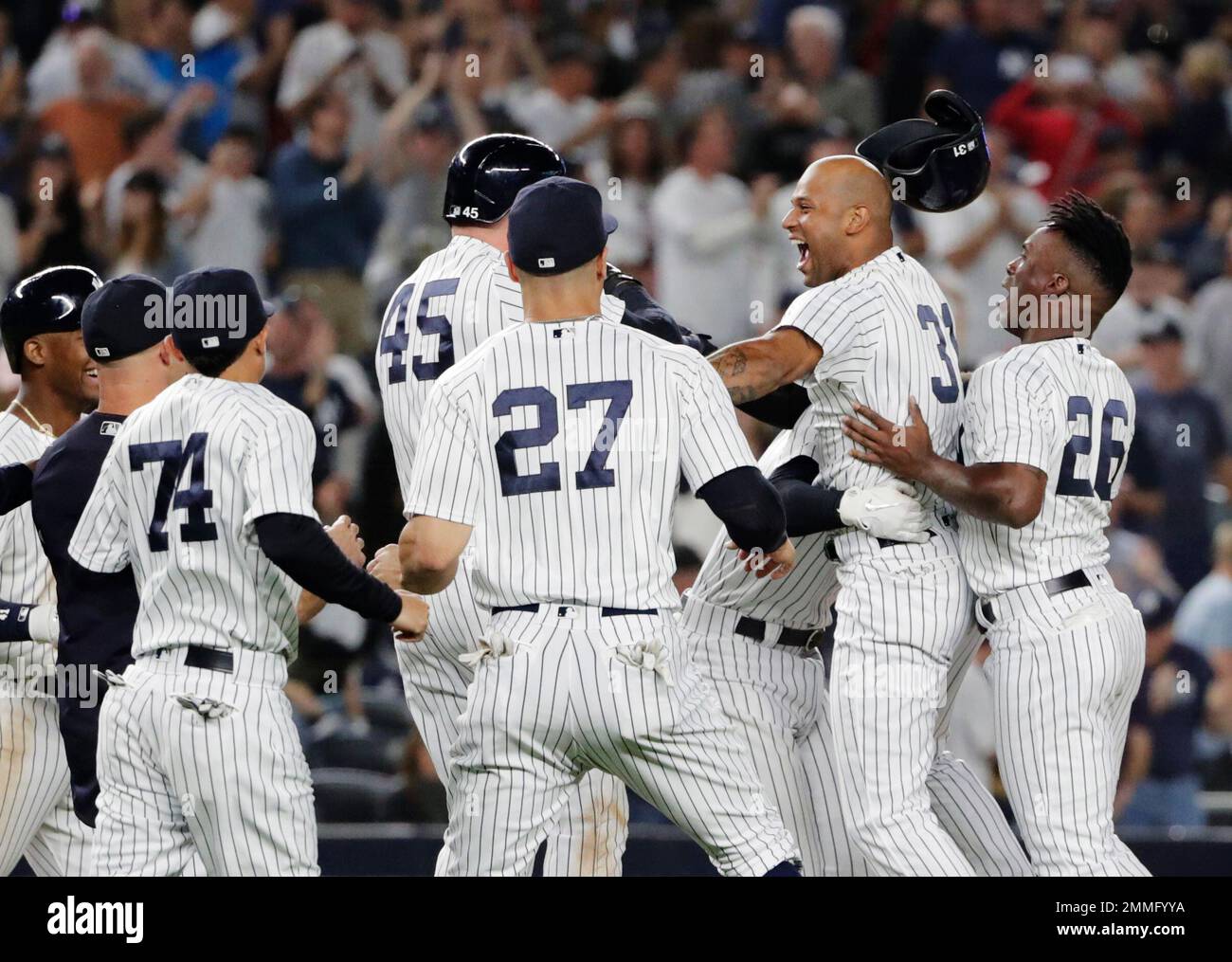 New York Yankees' Aaron Hicks (31) celebrates with teammates after ...