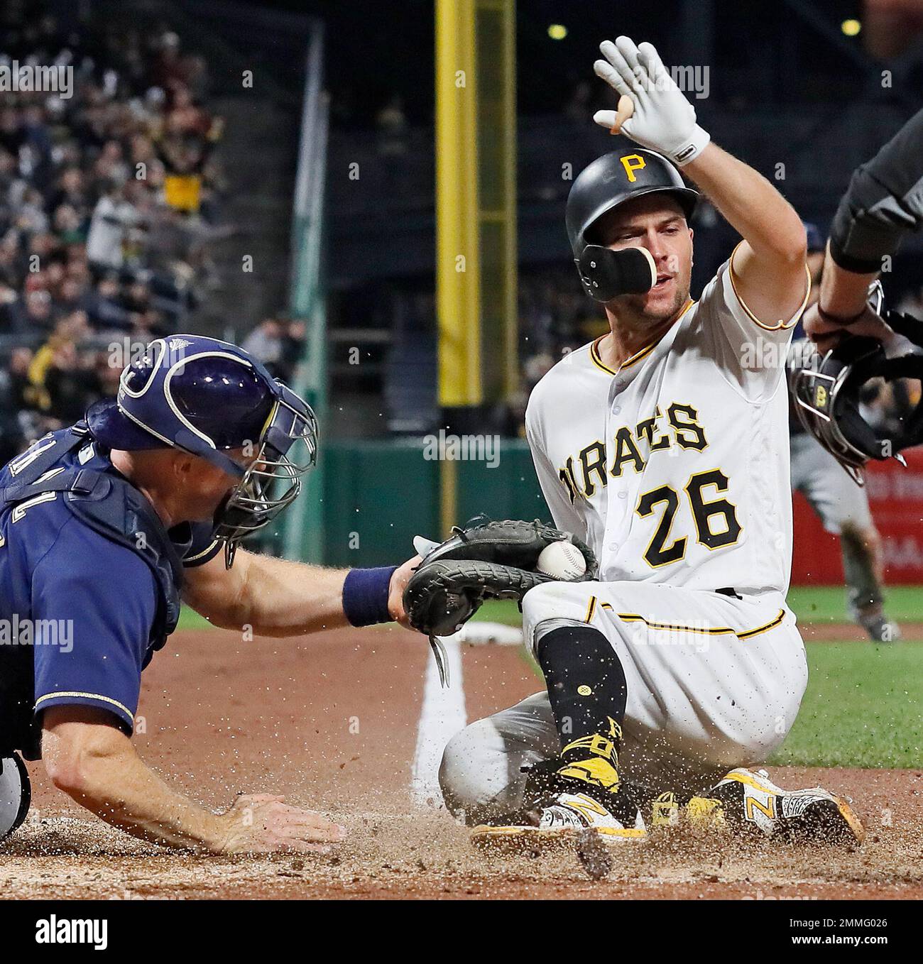 Pittsburgh Pirates' Adam Frazier (26) scores the second of two runs on ...