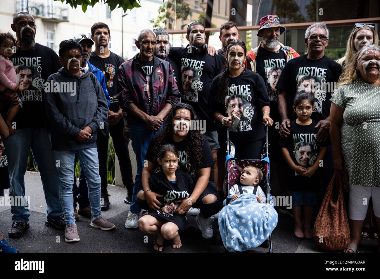 Veronica Nelson’s family members, friends and supporters pose for a ...