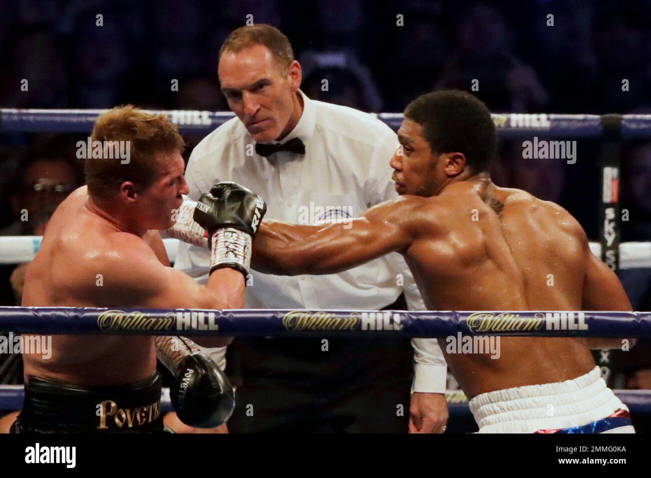 Referee Steve Gray watches closely seconds before stopping the fight ...